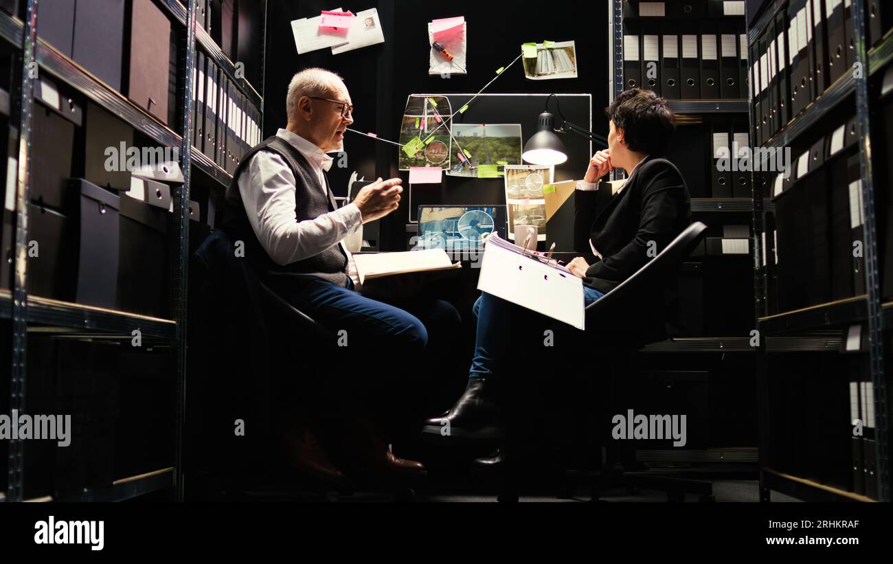 Partners review surveillance photos and classified case information ...