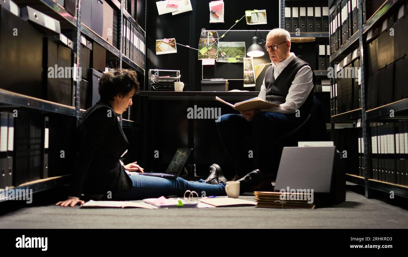 Detectives team conduct clues analysis with forensic evidence report ...