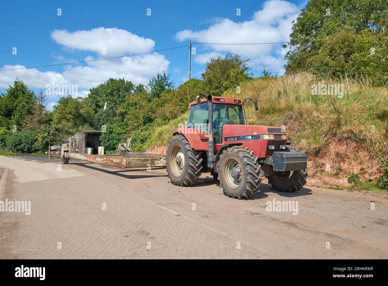 Tractor towing a large boat trailer Stock Photo - Alamy