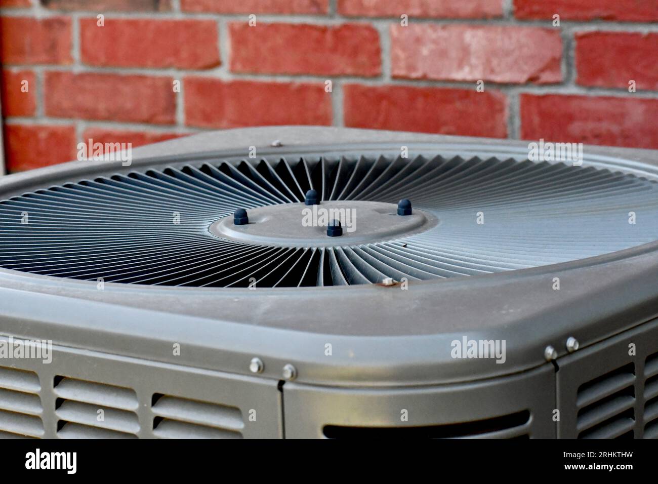 Outdoor air conditioning unit with red brick wall background Stock ...