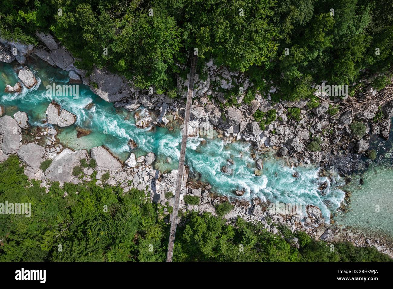 Suspension bridge over alpine Soca river in Slovenia Stock Photo - Alamy