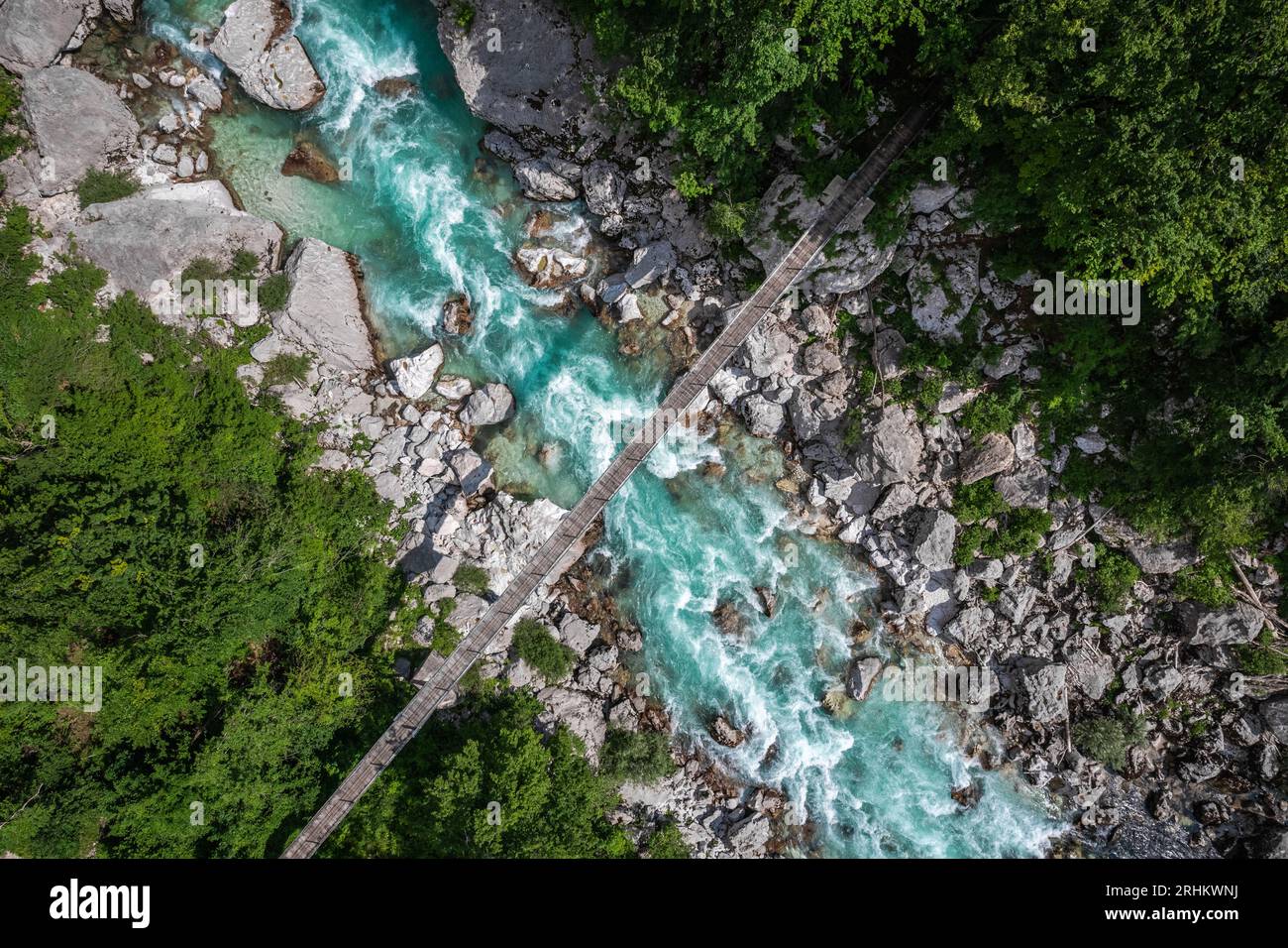 Suspension bridge over alpine Soca river in Slovenia Stock Photo - Alamy