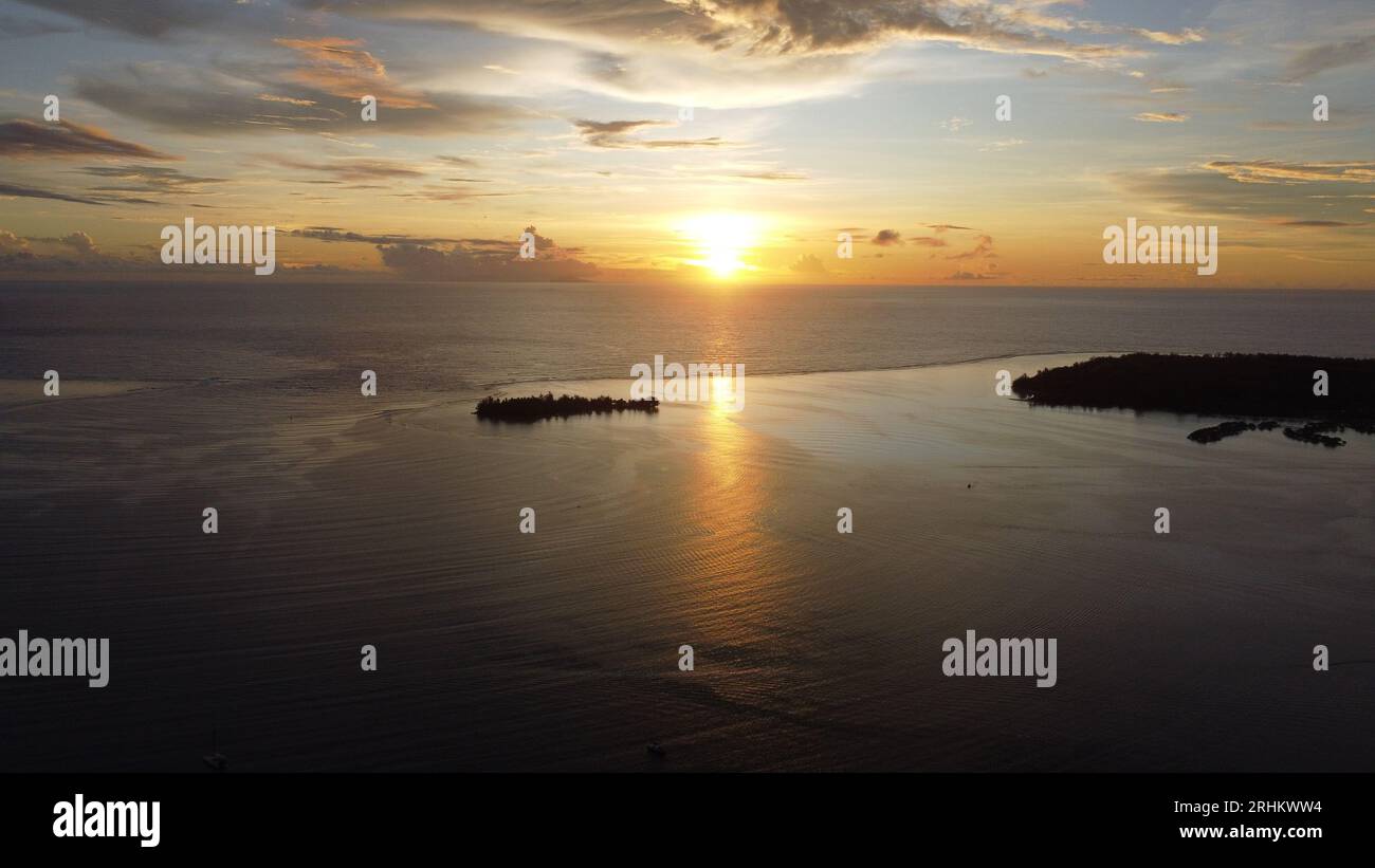 Aerial sunset views of the stunning Bora Bora Atoll; French Polynesia ...