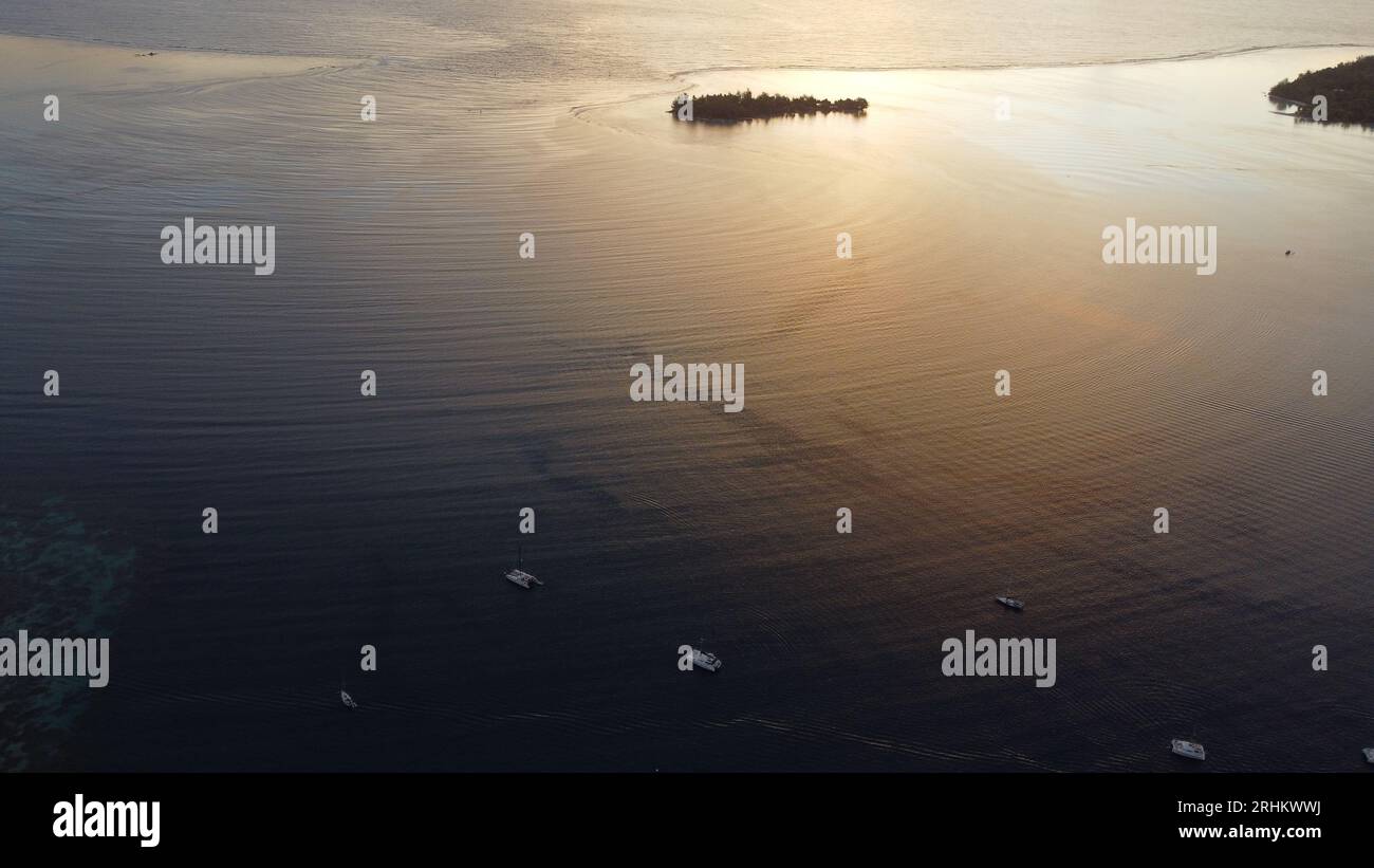 Aerial sunset views of the stunning Bora Bora Atoll; French Polynesia ...