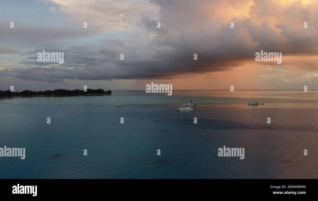 Aerial sunset views of the stunning Bora Bora Atoll; French Polynesia ...