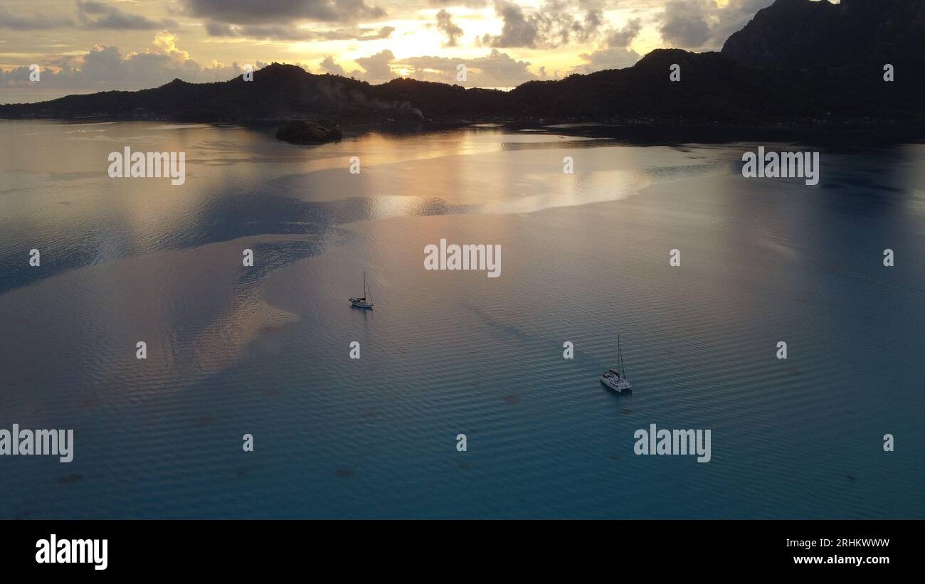 Aerial sunset views of the stunning Bora Bora Atoll; French Polynesia ...