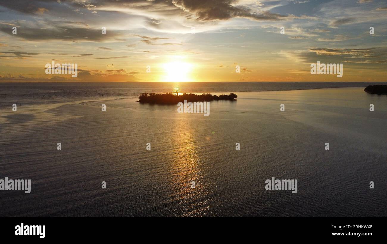 Aerial sunset views of the stunning Bora Bora Atoll; French Polynesia ...