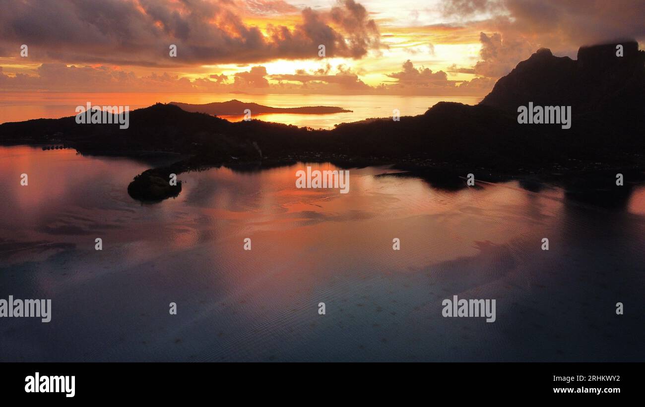 Aerial sunset views of the stunning Bora Bora Atoll; French Polynesia ...