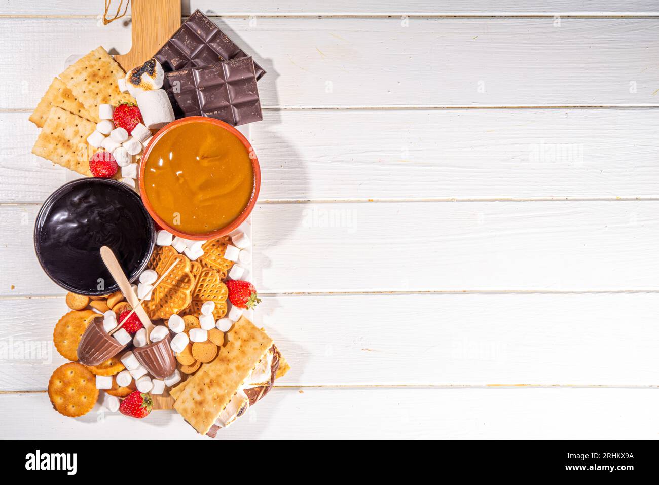 S'mores home party food and ingredients. Smores buffet background with ...