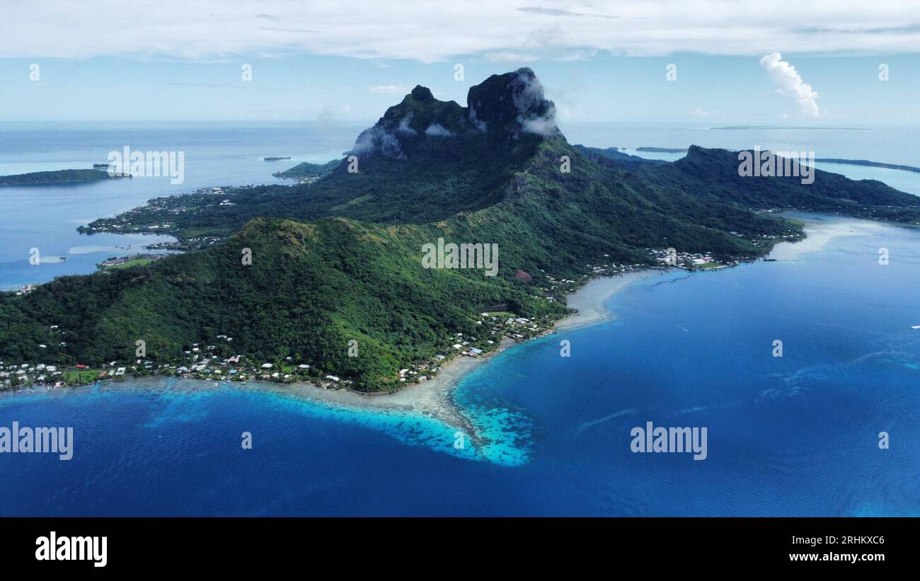 Aerial views on the Mt. Otemanu at the stunning Bora Bora Atoll; French ...