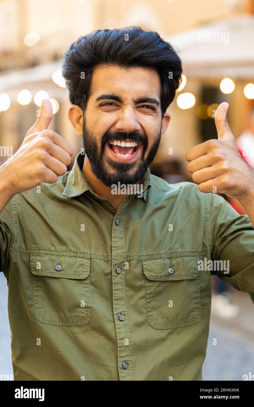 Indian young man shouting celebrating hi-res stock photography and ...