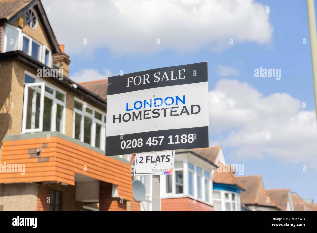 Real estate agent signs for sale and rent in London Stock Photo - Alamy