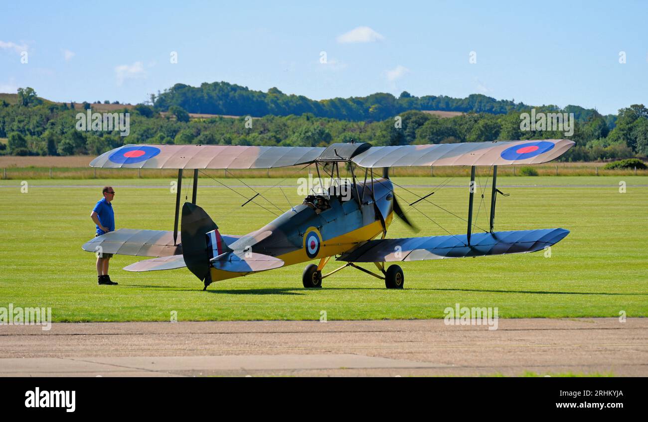 The Classic Wings camouflaged WWII trainer DH Tiger Moth and ground ...