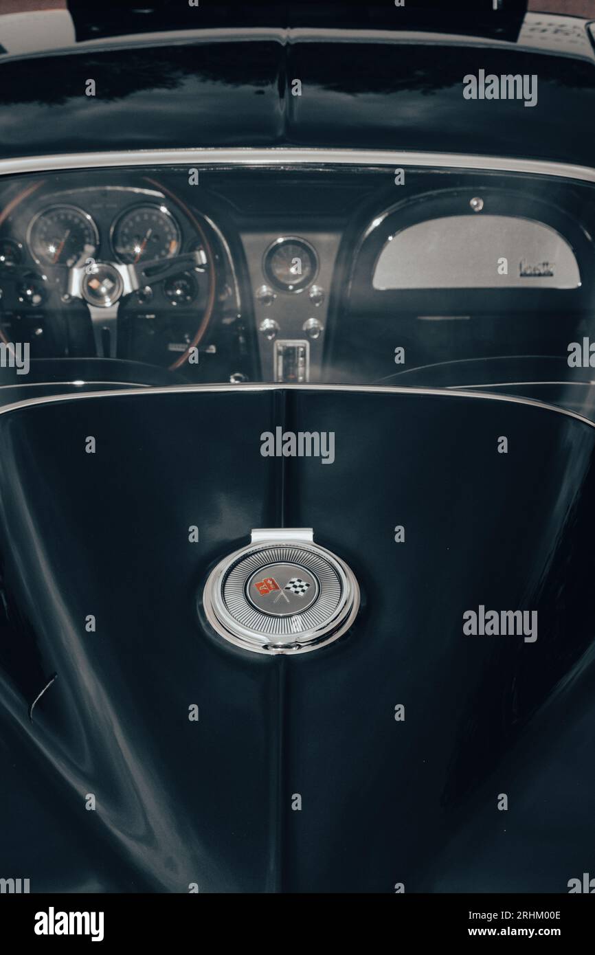 Colour photographs of a range of corvette stingray cars including close ...