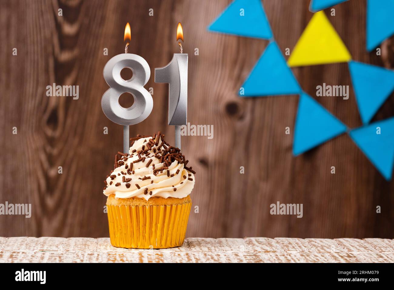 Birthday card with candle number 81 - Wooden background with pennants ...
