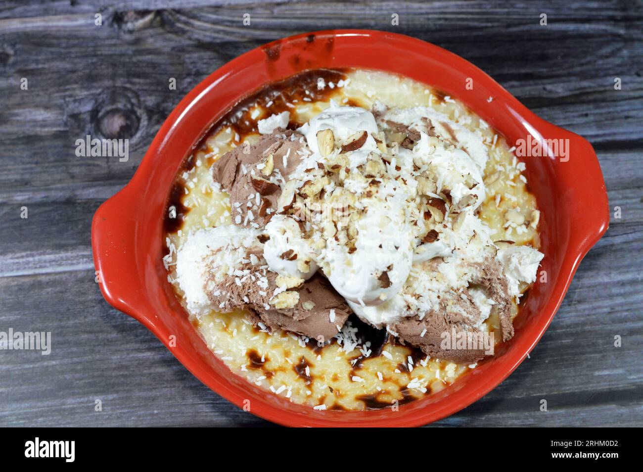 Baked rice pudding, rice, corn flour, sugar, milk Topped with whipped ...
