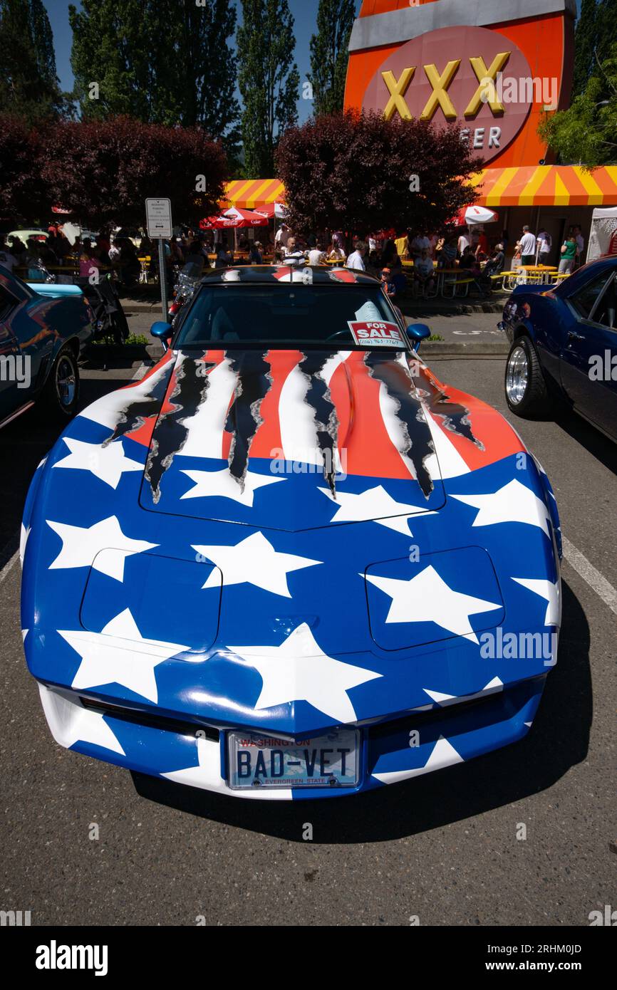 Colour photographs of a range of corvette stingray cars including close ...