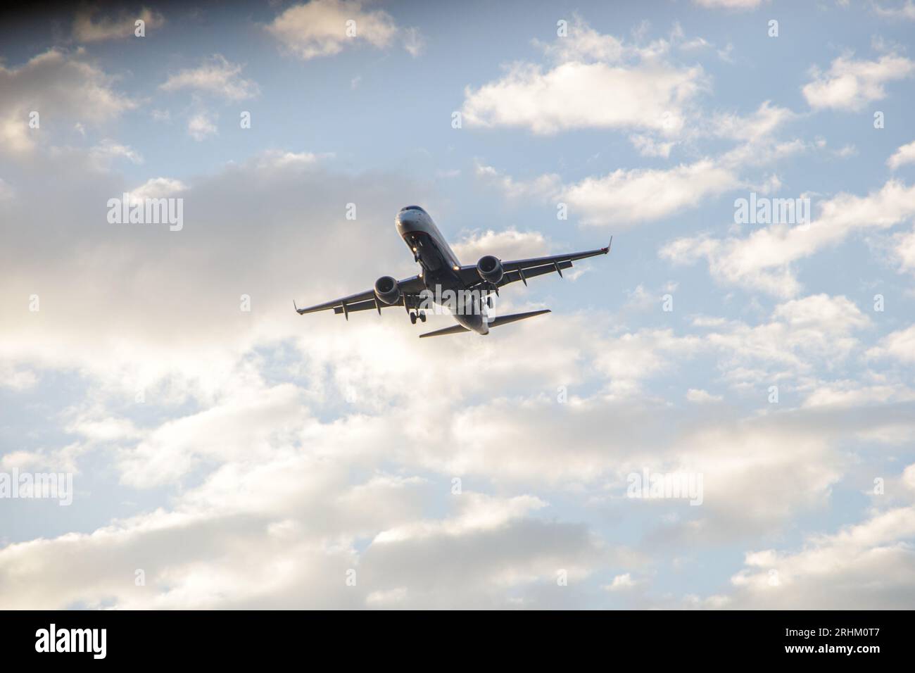 plane flying in the sky with clouds in Rio de Janeiro, brazil Stock ...
