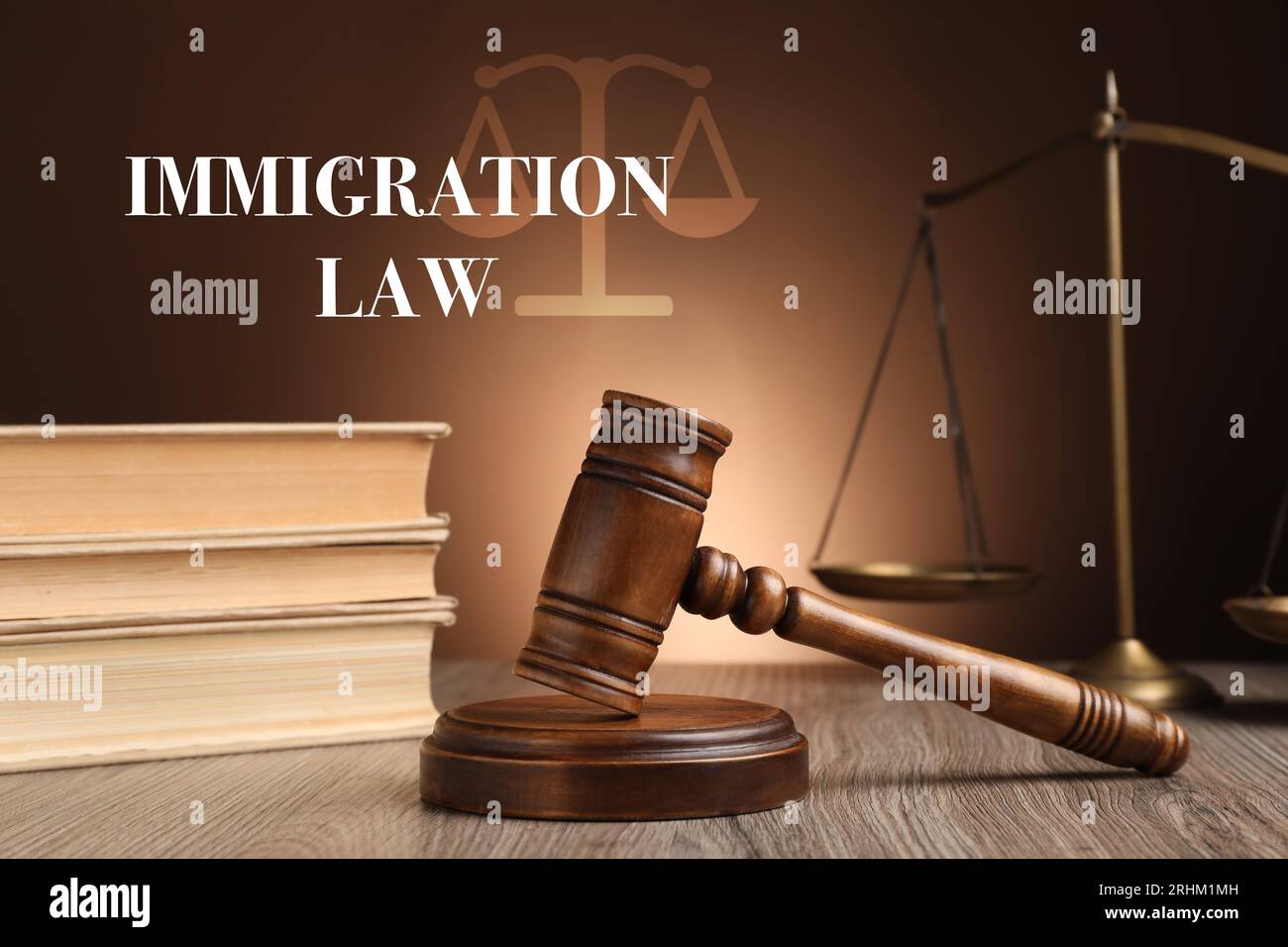 Immigration law. Judge's gavel, scales of justice and books on wooden ...