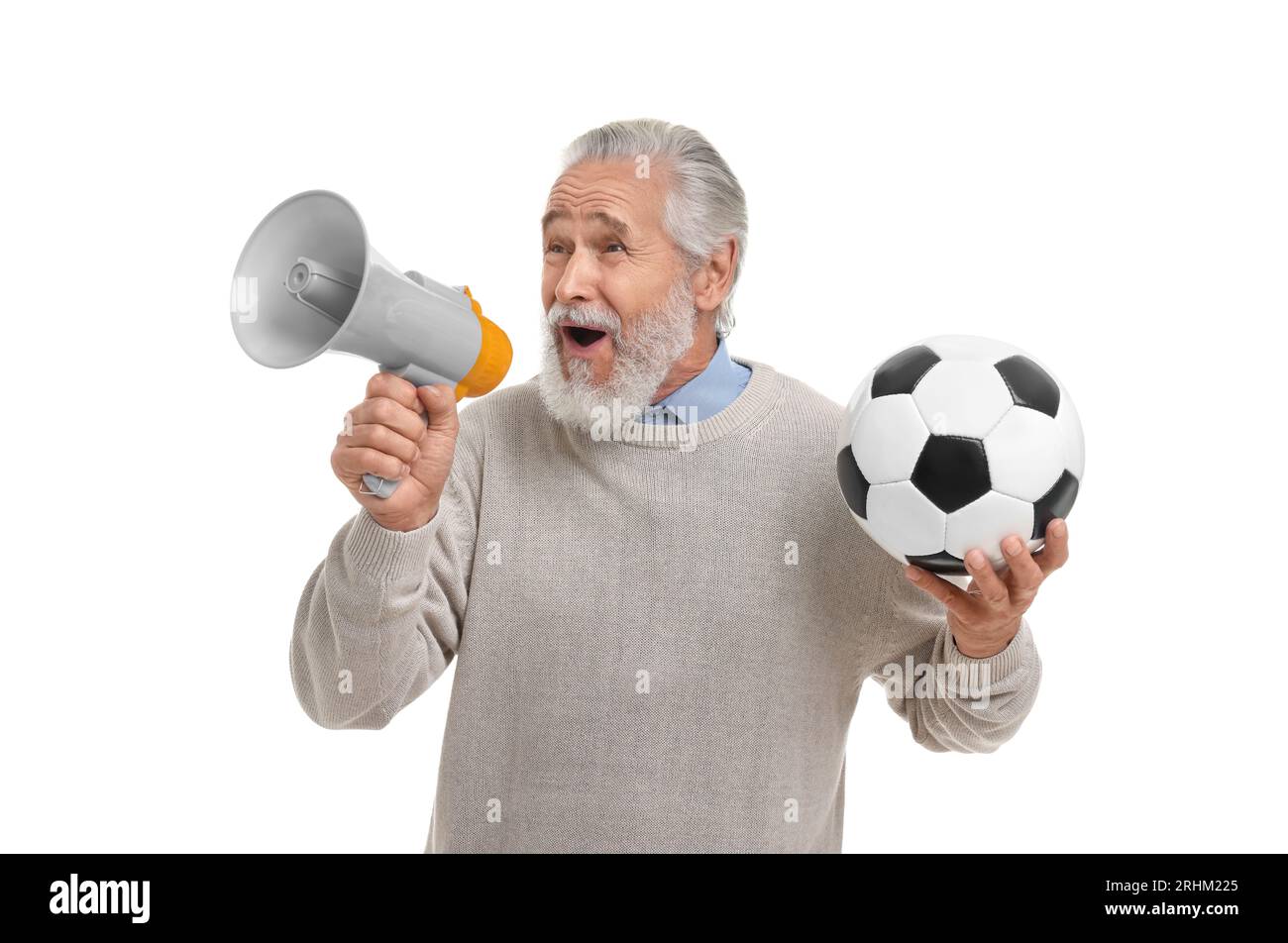 Emotional senior sports fan with soccer ball using megaphone isolated ...