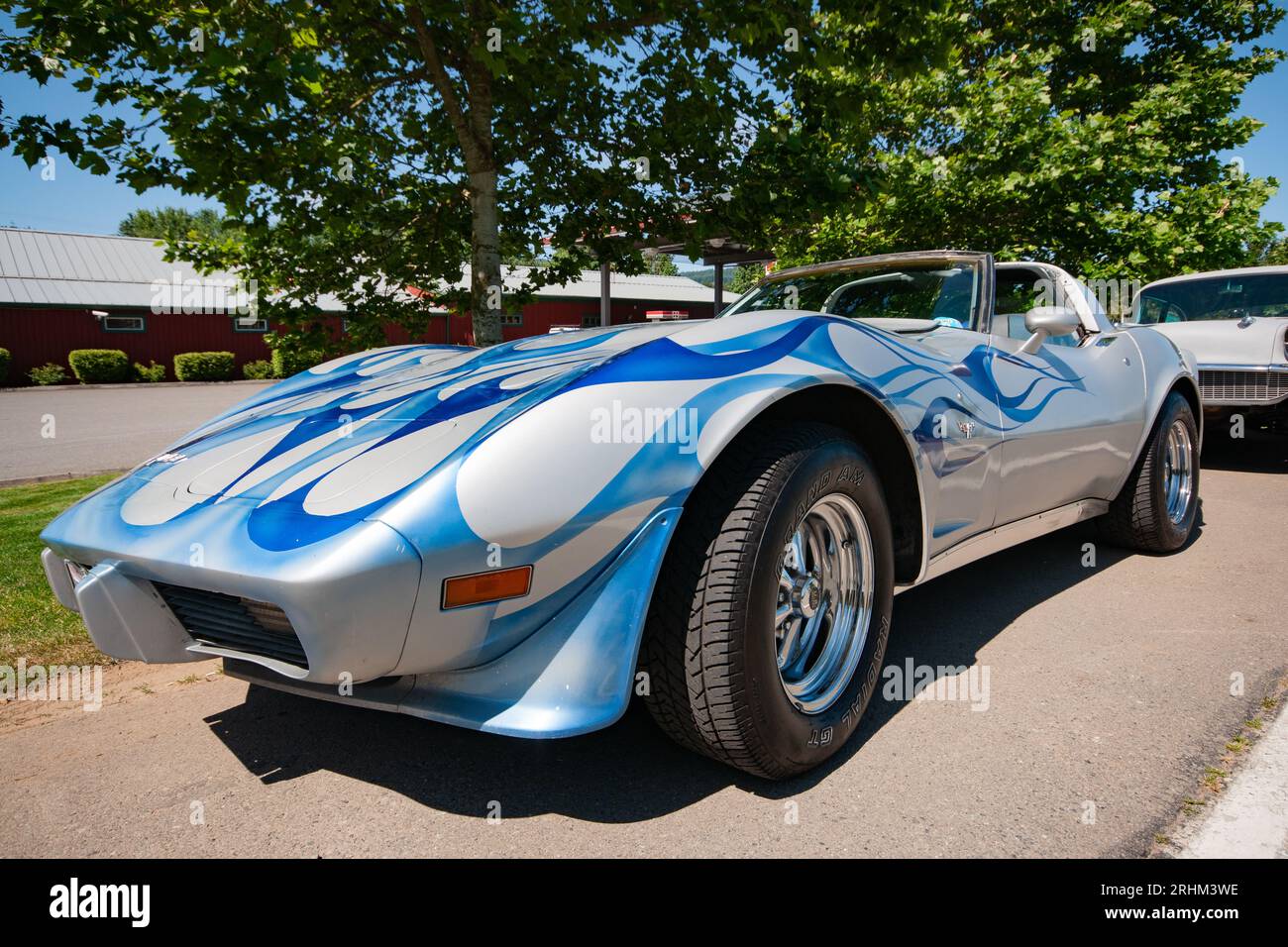 Colour photographs of a range of corvette stingray cars including close ...