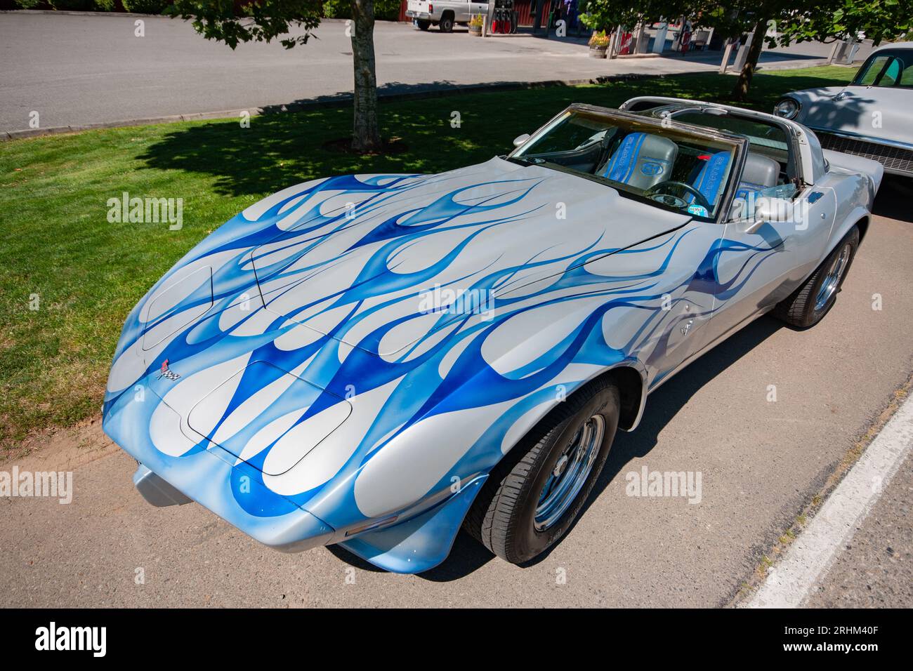 Colour photographs of a range of corvette stingray cars including close ...
