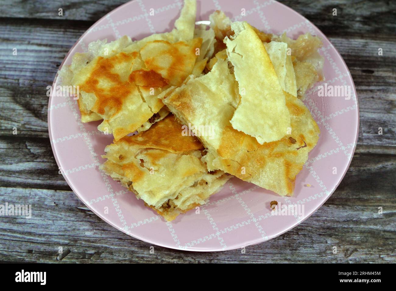 Egyptian Roqaq stuffed with minced beef meat baked in the oven, Roqaq ...