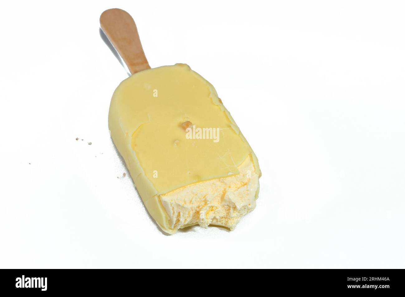 Vanilla ice cream stick coated and covered with a layer of white ...