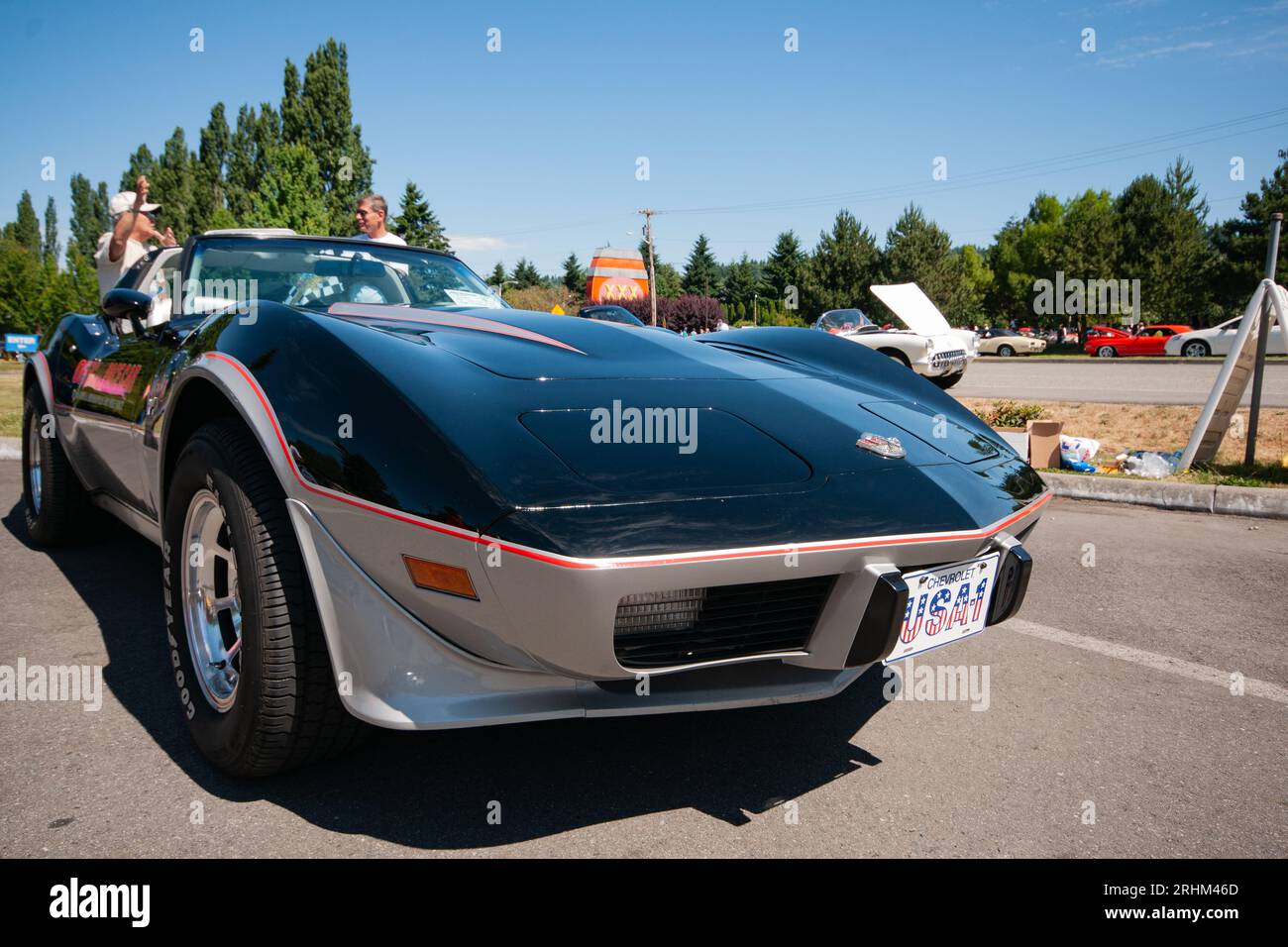 Colour photographs of a range of corvette stingray cars including close ...