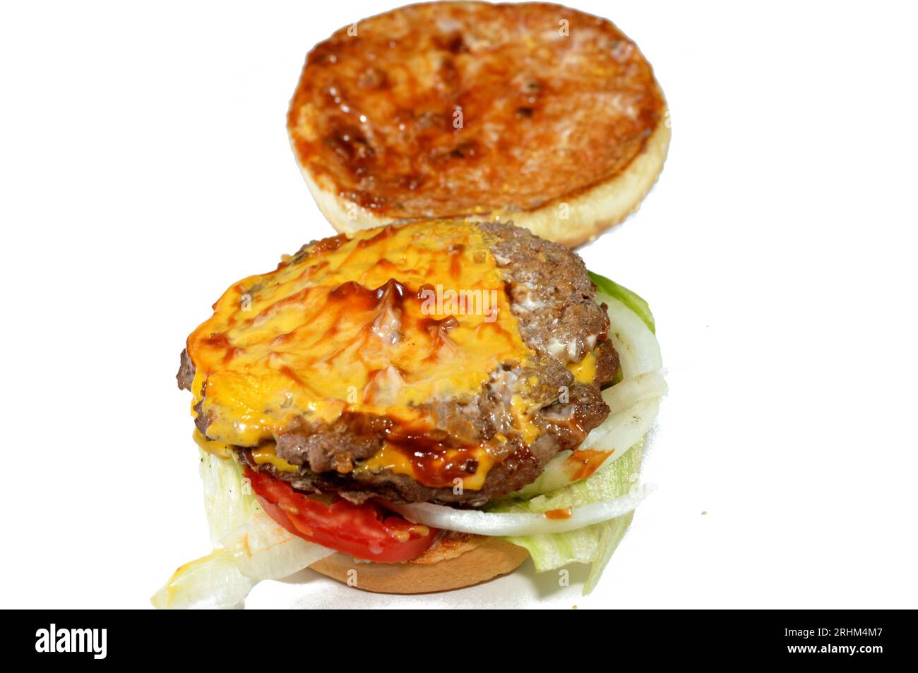 A juicy thick double beef patty with cheese covered with sauce, crispy ...