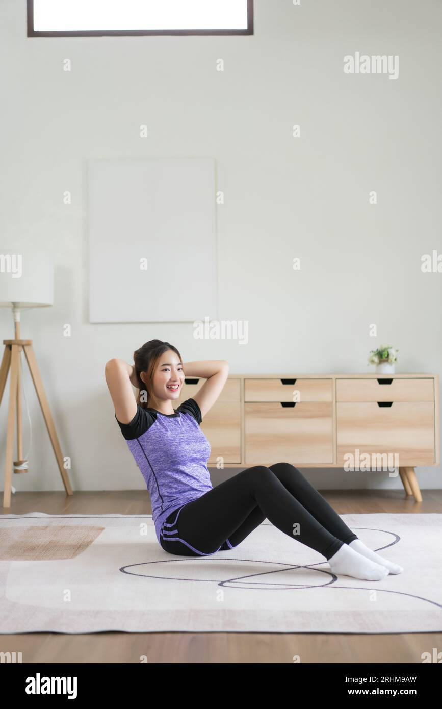 Yoga leg behind head hi-res stock photography and images - Alamy