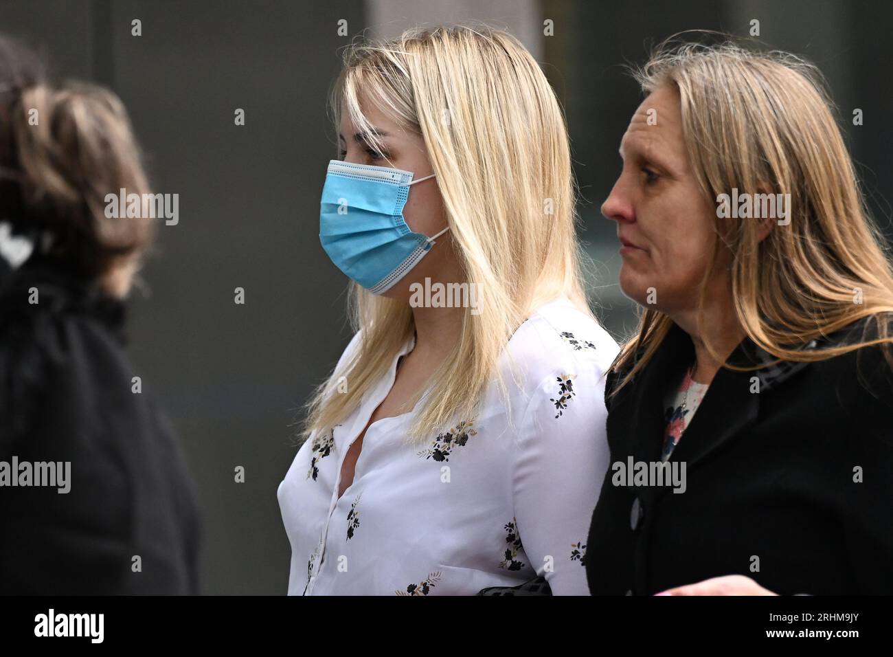 Melbourne, Australia. 18th Aug, 2023. Alisha Fagan (centre) arrives to ...
