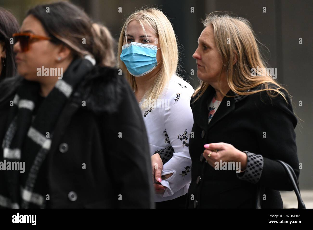 Melbourne, Australia. 18th Aug, 2023. Alisha Fagan (centre) arrives to ...
