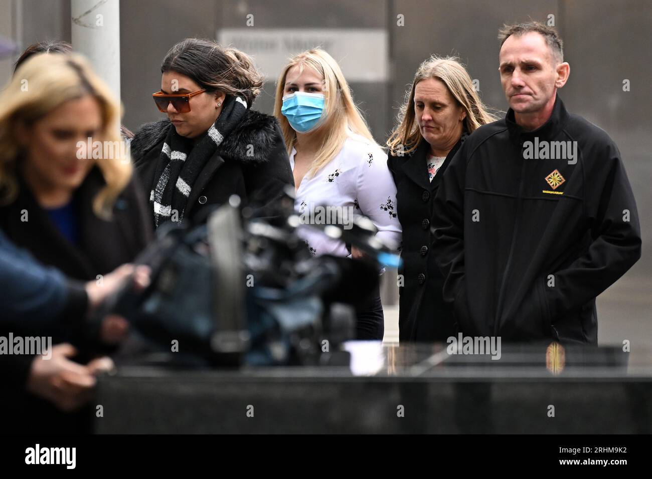Melbourne, Australia. 18th Aug, 2023. Alisha Fagan (centre) arrives to ...