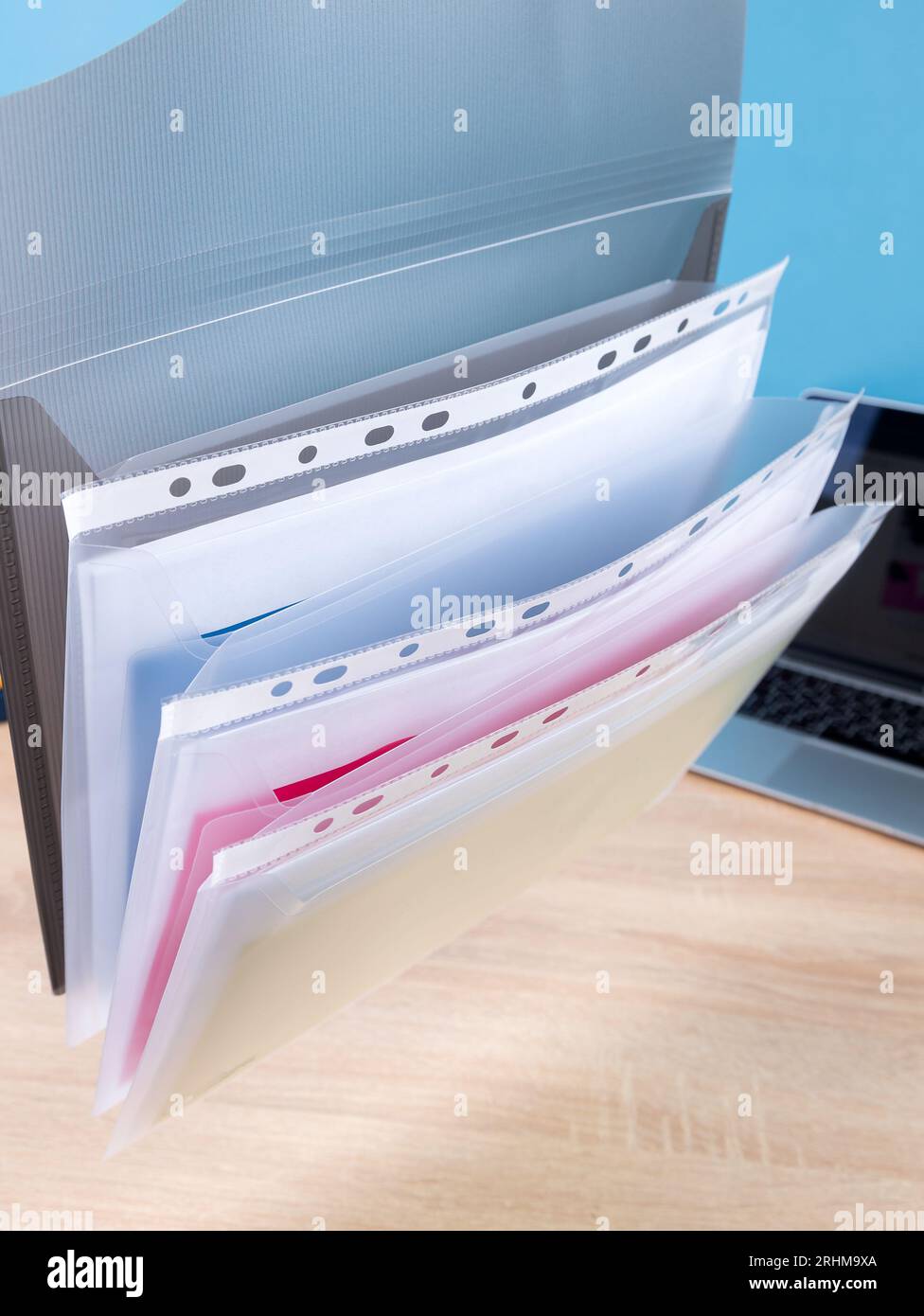 Transparent plastic office folder on wooden background. Office Folder ...