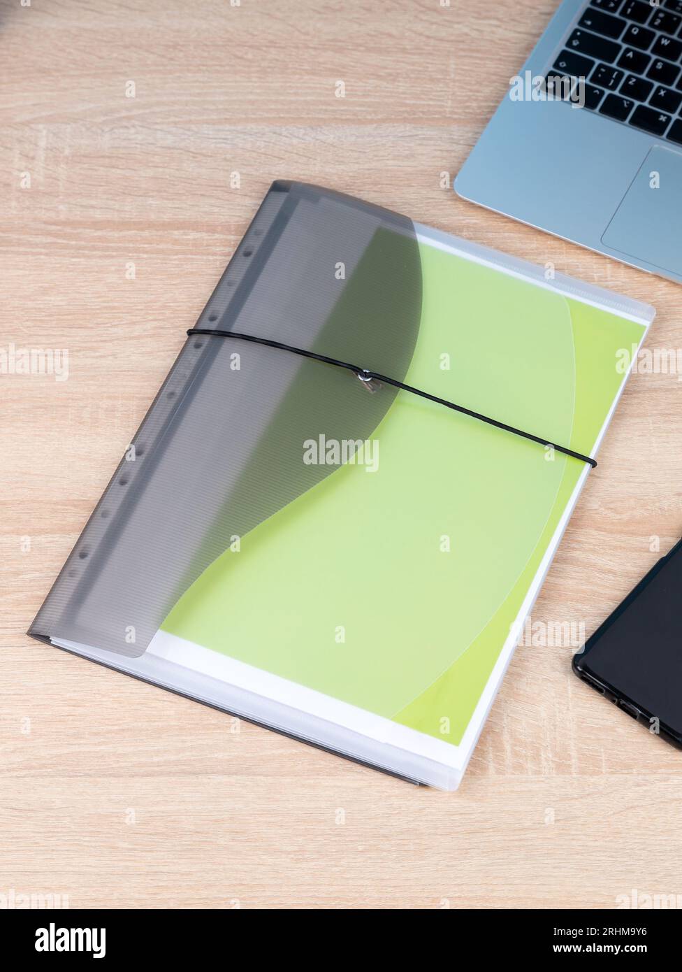 Transparent plastic office folder on wooden background. Office Folder ...