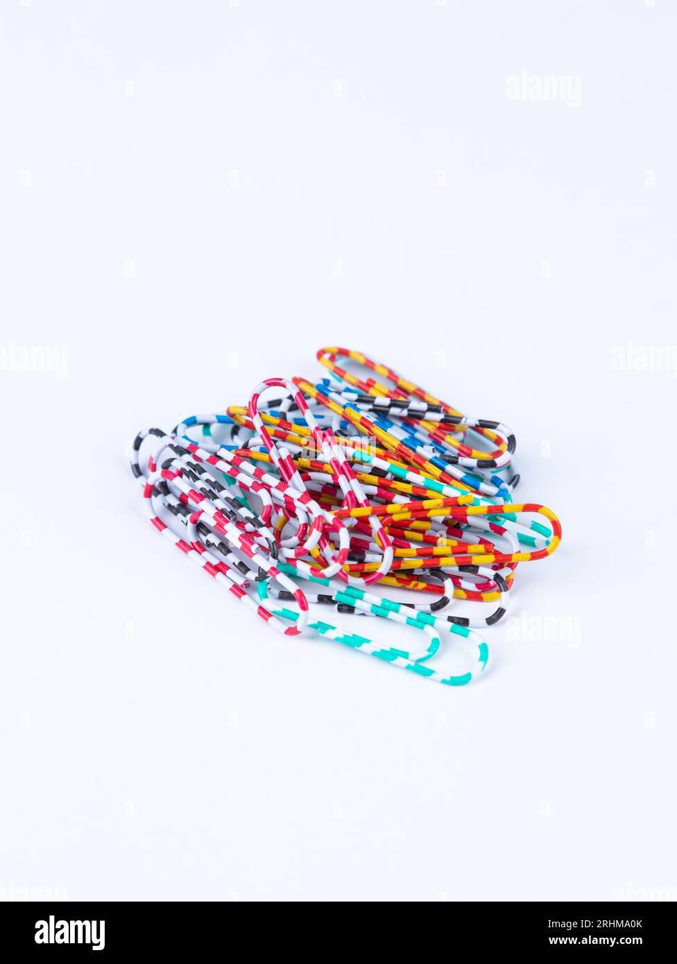 Colorful collection set of Paper Clips on white paper. ready for your ...
