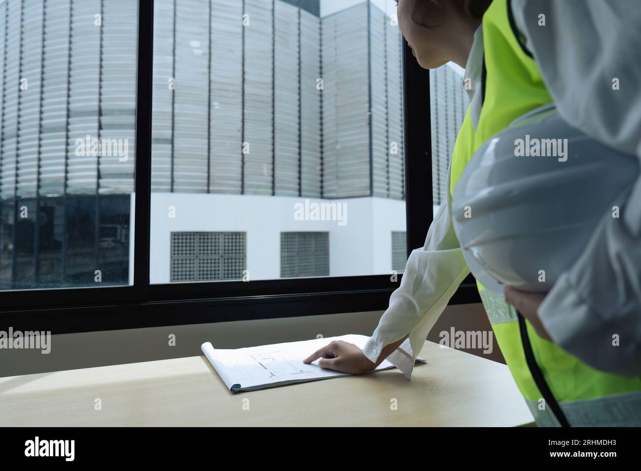Building construction management with an architect and engineering ...