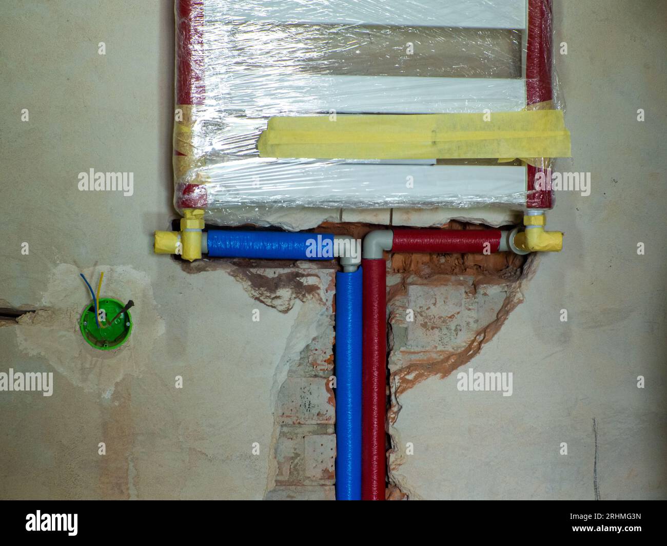 Plumber installing new radiator hi-res stock photography and images - Alamy