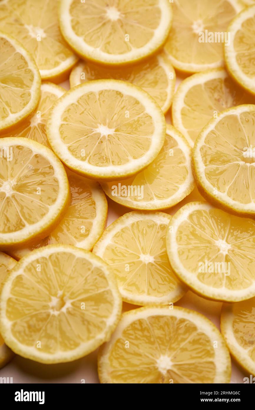 top down background view made of Fresh Sliced organic lemons close-up ...