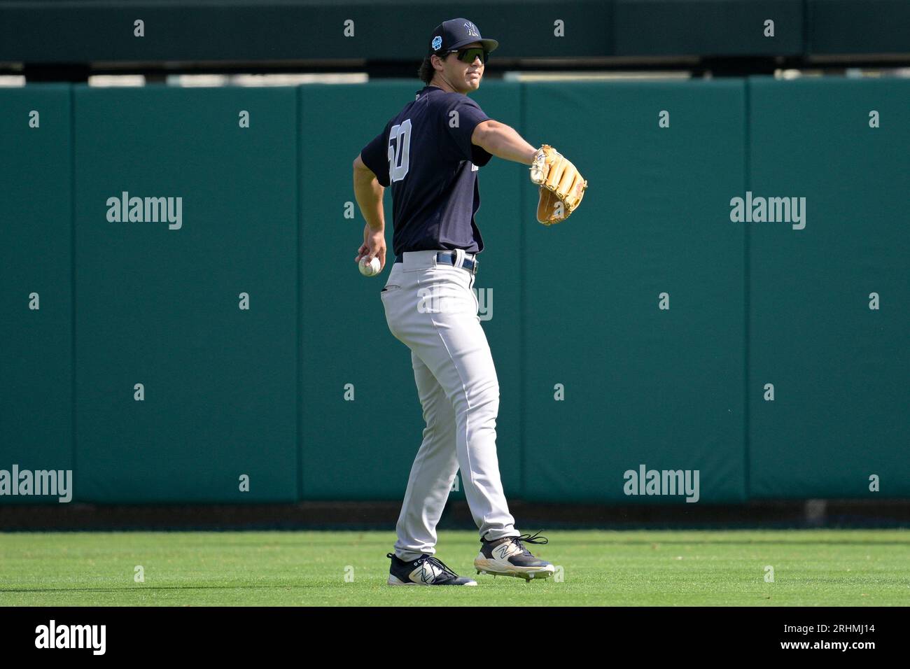 New York Yankees outfielder Spencer Jones throws during the sixth ...