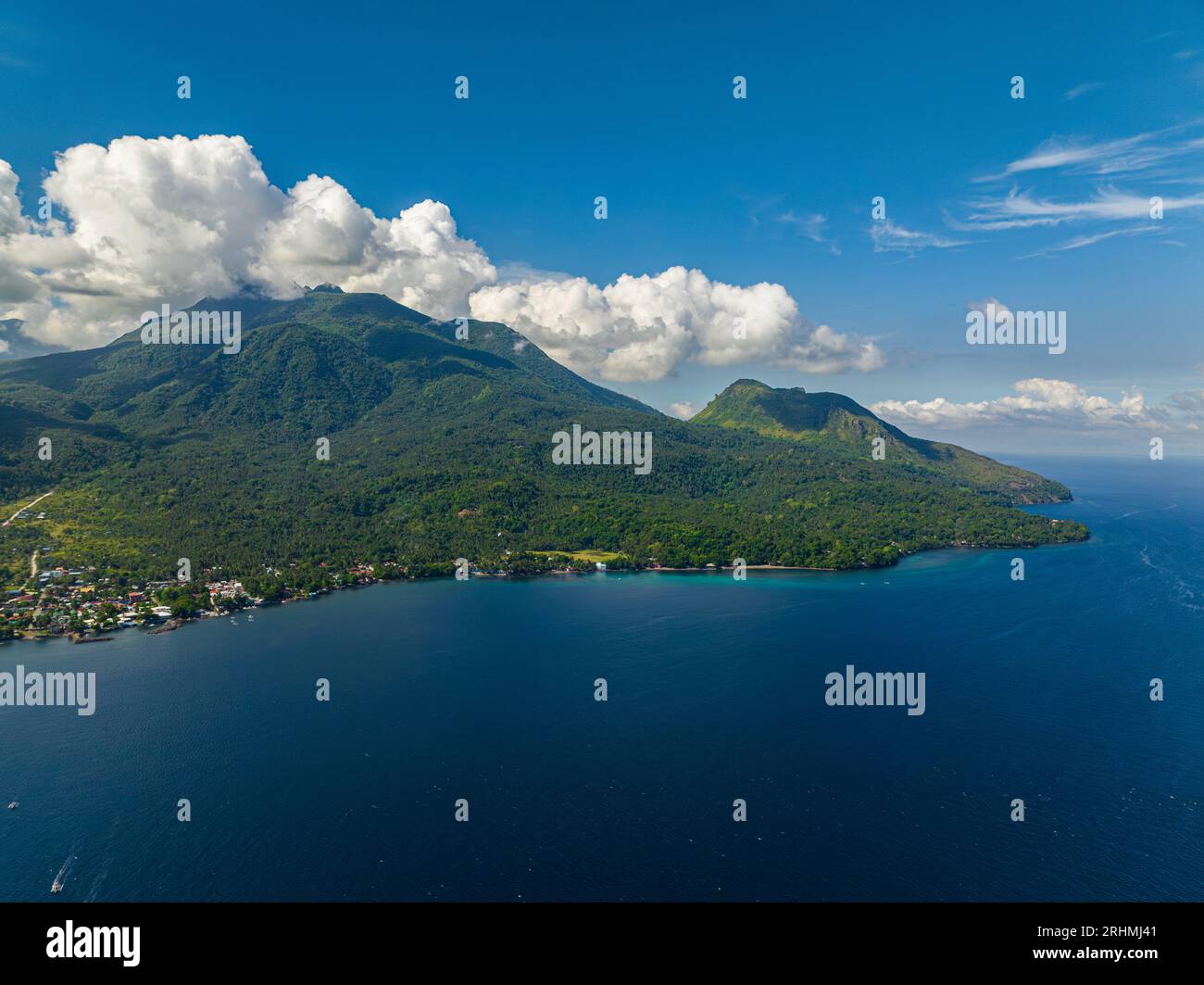Tropical Island surounded by deep blue sea. Camiguin Island ...