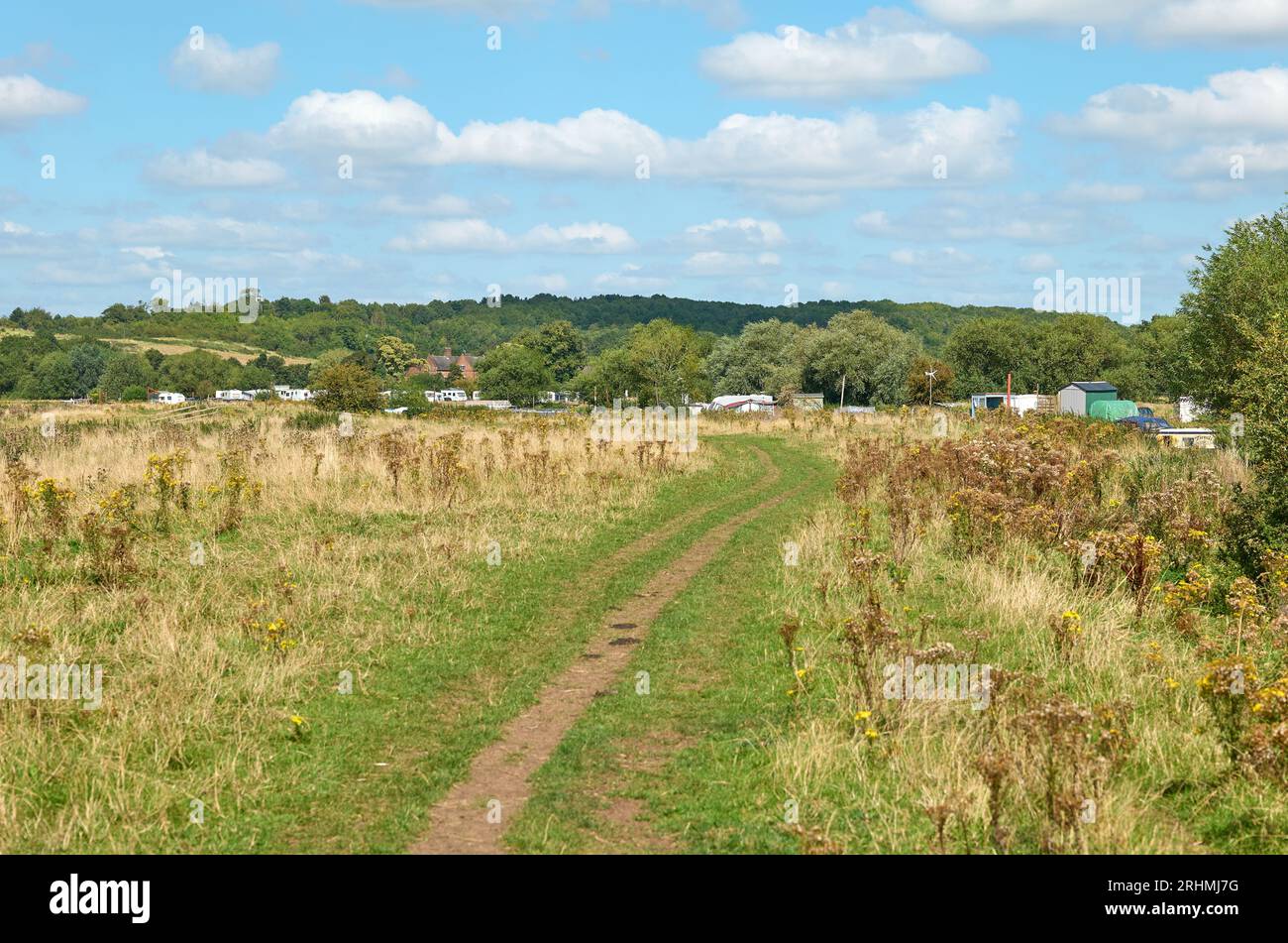 Worn footpath next to a river Stock Photo - Alamy