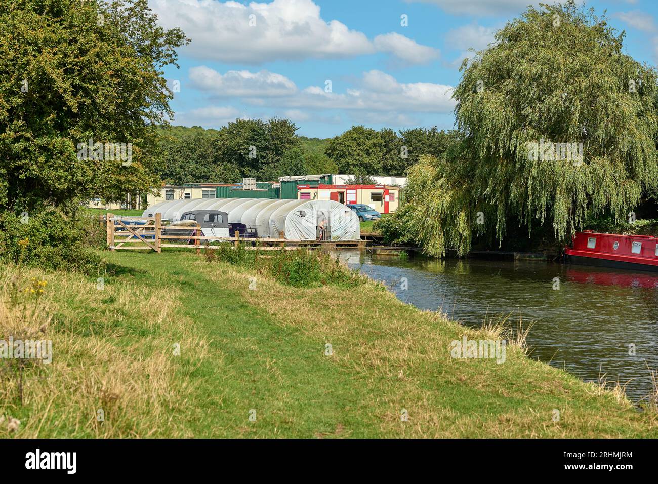 Man working on a floating workshop at Redhill Marina, Nottinghamshire ...