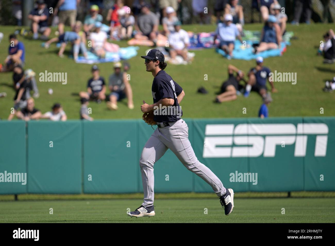 New York Yankees outfielder Spencer Jones jogs off of the field during ...