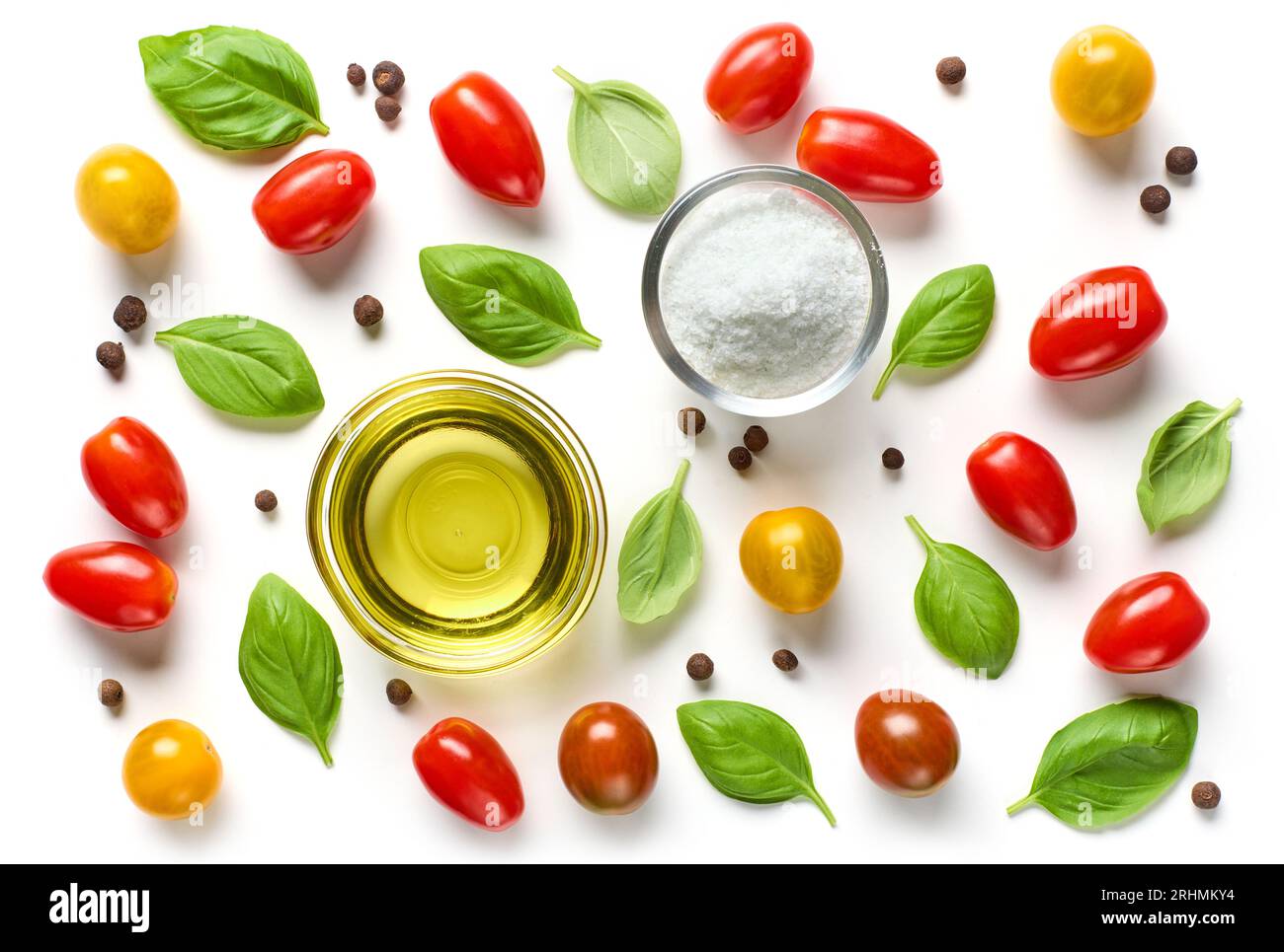 flat lay composition of oil, salt and vegetables isolated on white ...