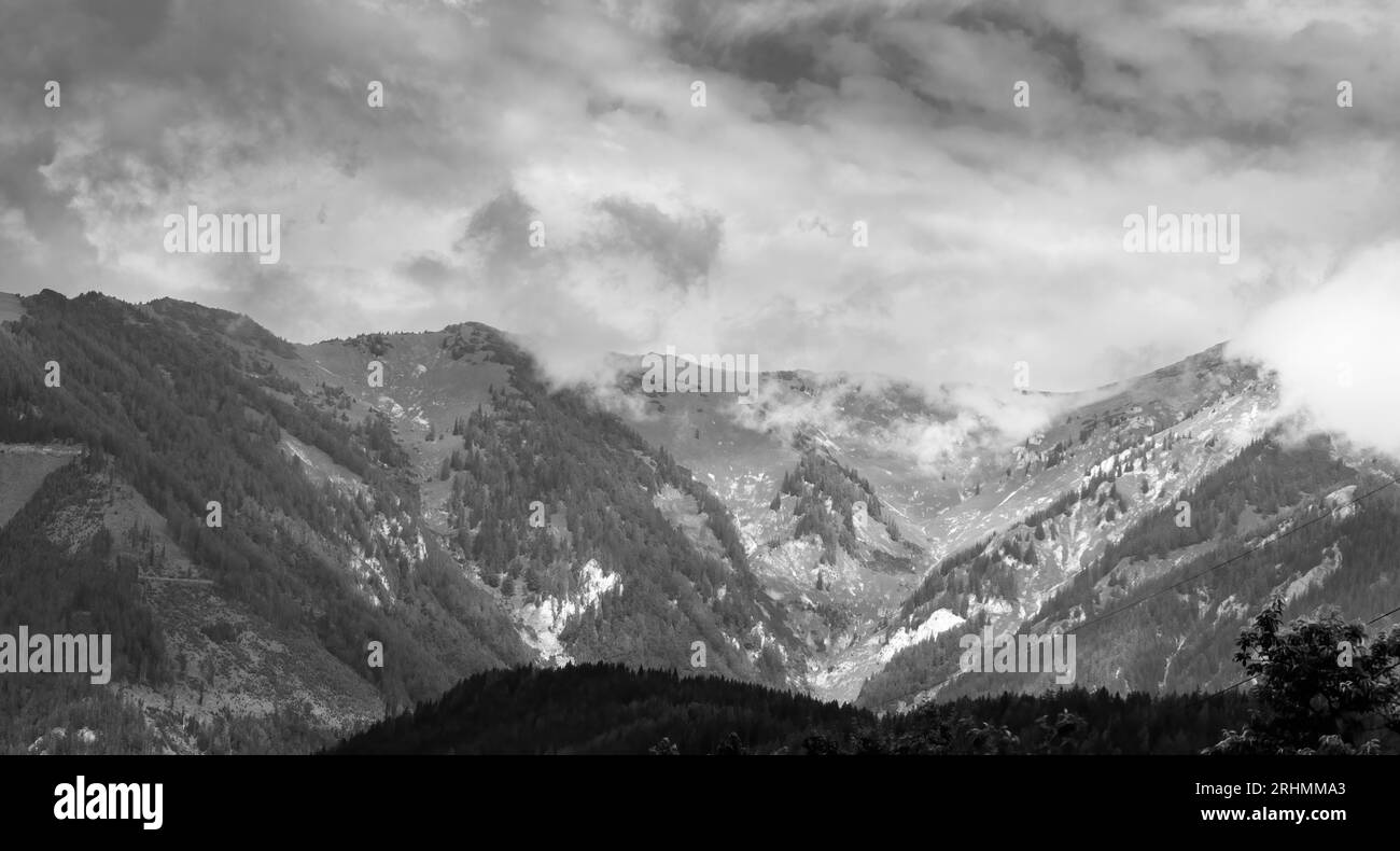 Alps mountains in stormy clouds, in black and white Stock Photo - Alamy