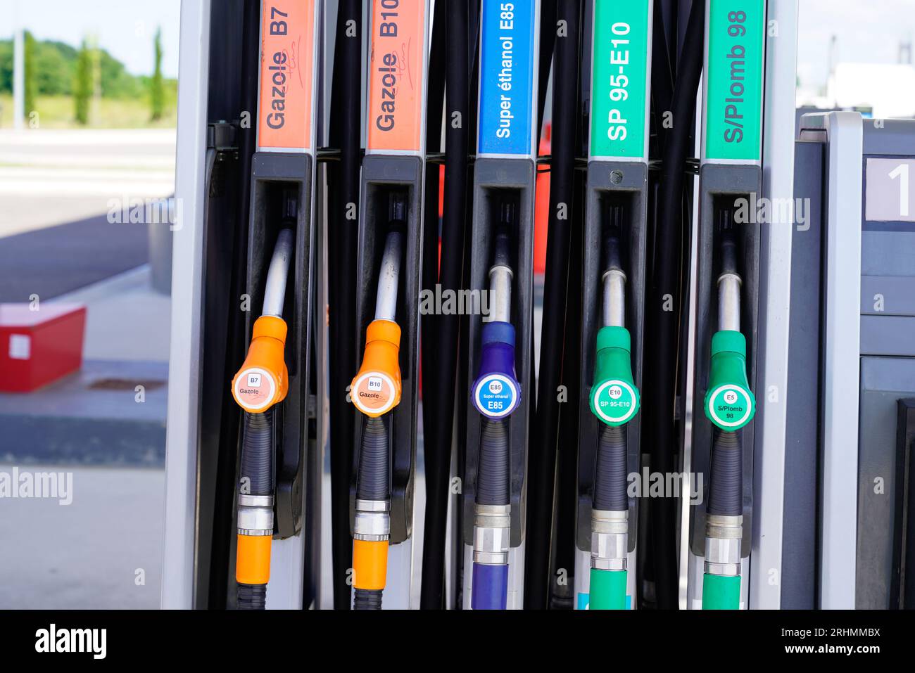 gas pump french text sign green yellow orange blue color fuel gasoline ...
