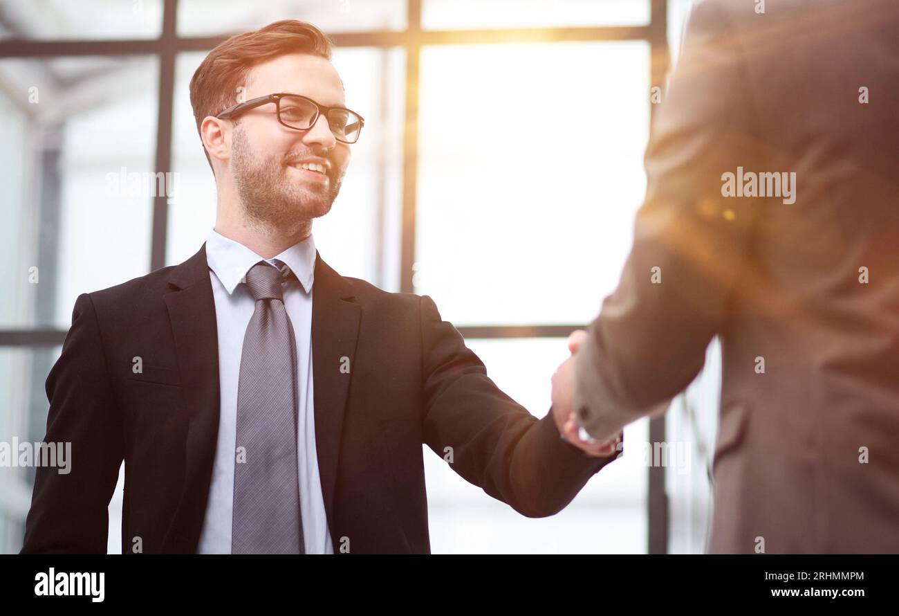 men colleagues in suits are meeting in office corridor Stock Photo - Alamy