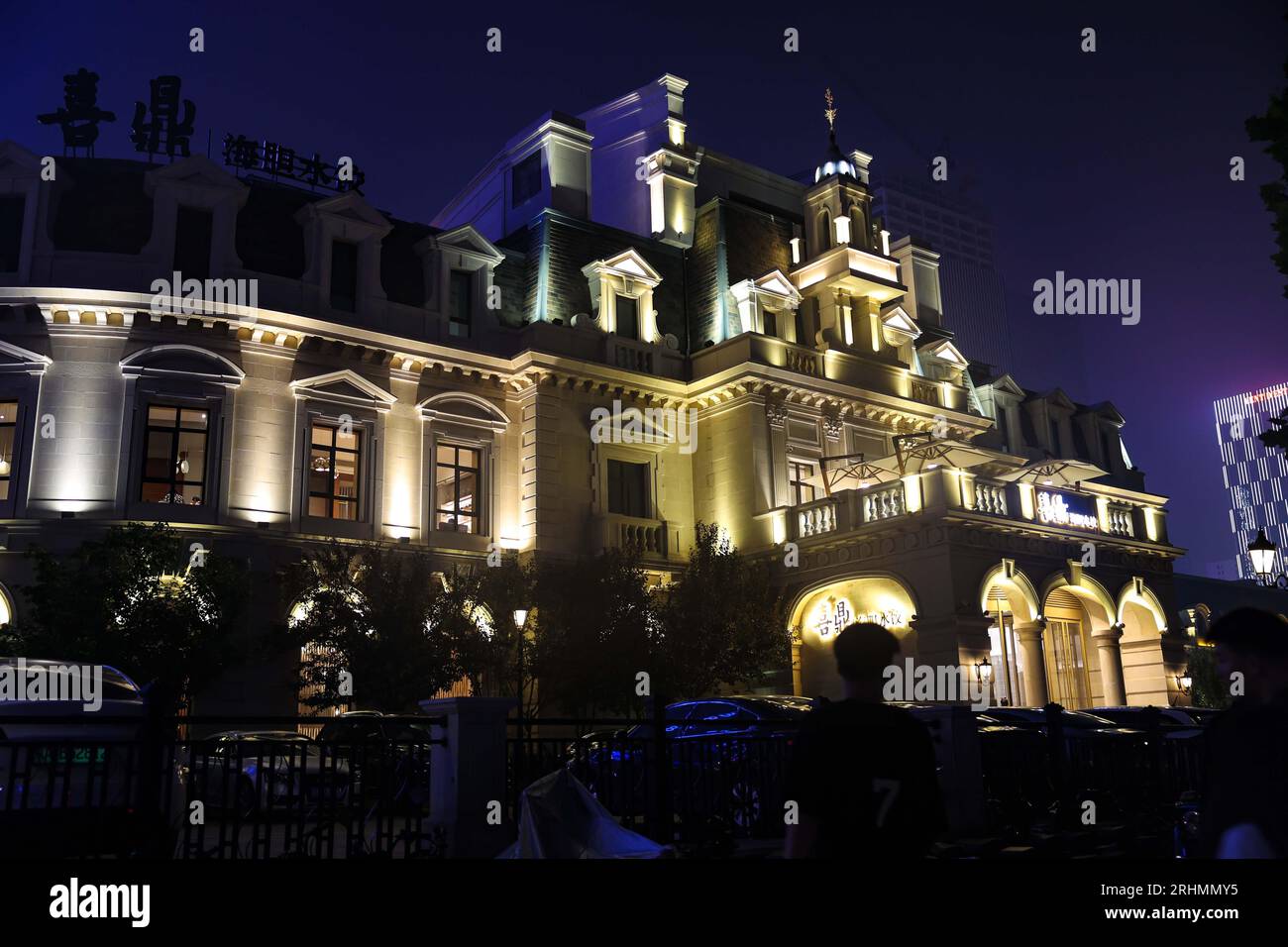 Visitors enjoy night view at a scenic spot featuring landscape similar ...
